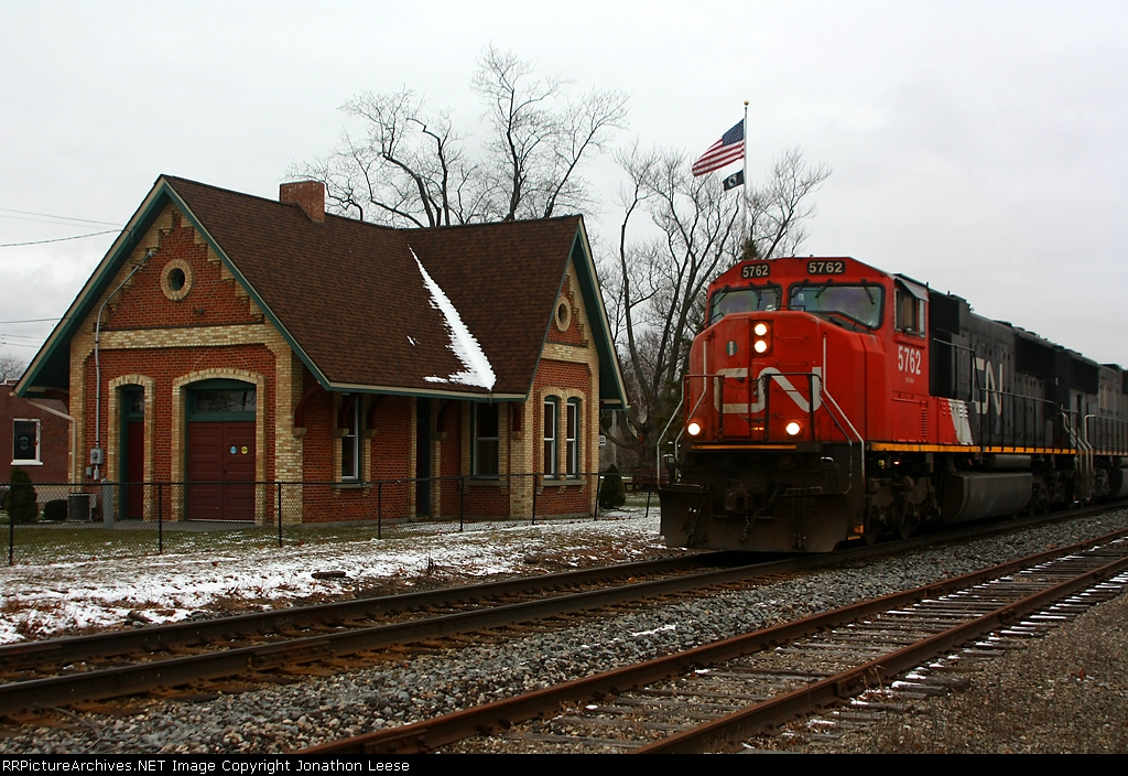 490 passing the nicely restored depot